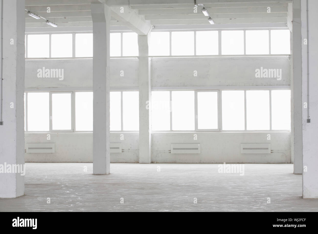 Large empty warehouse Stock Photo - Alamy