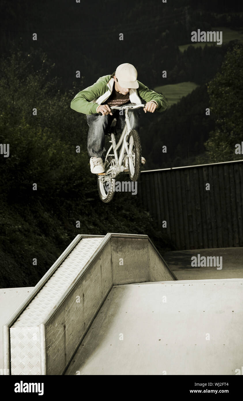 Man performing bike stunts hi-res stock photography and images - Alamy