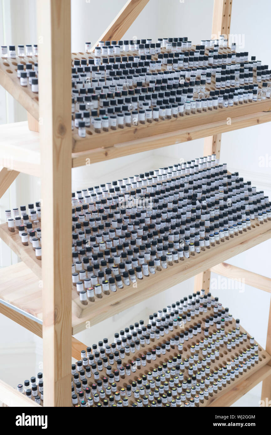 Vials in wooden stand at laboratory Stock Photo - Alamy