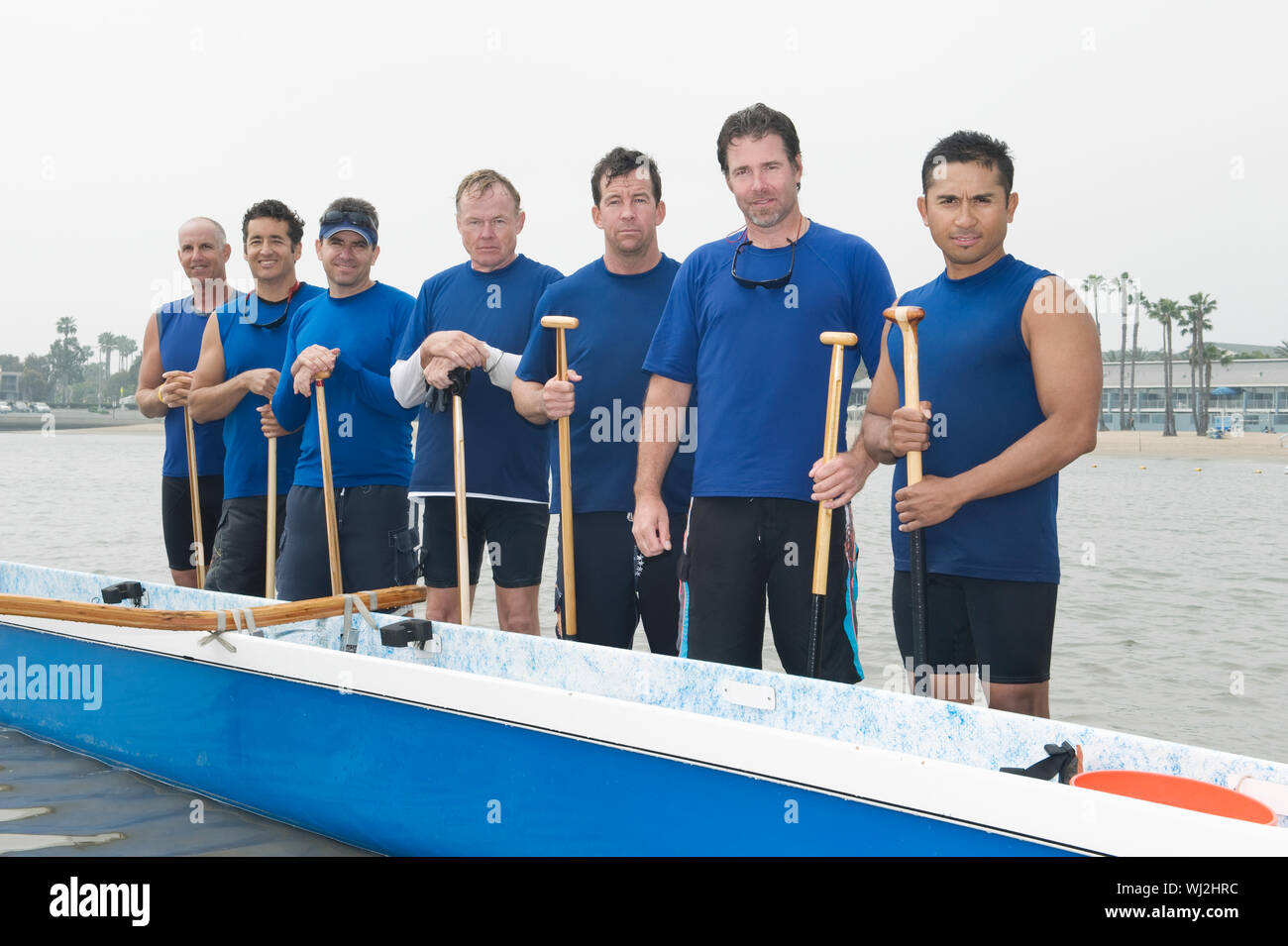 Group portrait of multiethnic outrigger canoeing team Stock Photo - Alamy