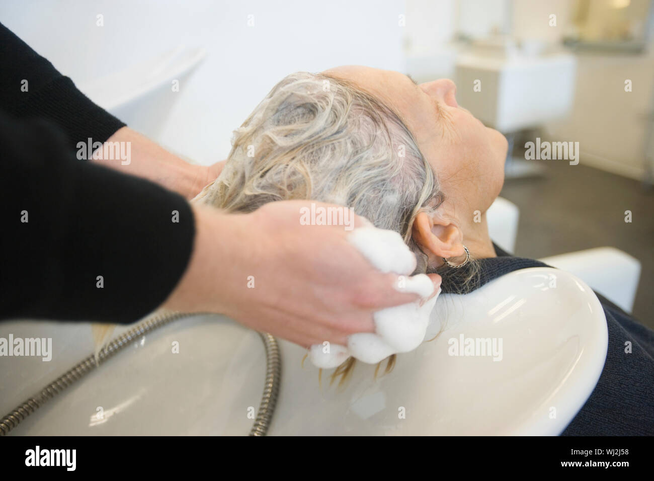 Woman lather shampoo hi-res stock photography and images - Alamy