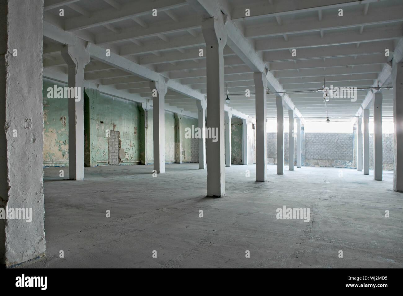 Interior of an abandoned warehouse Stock Photo - Alamy