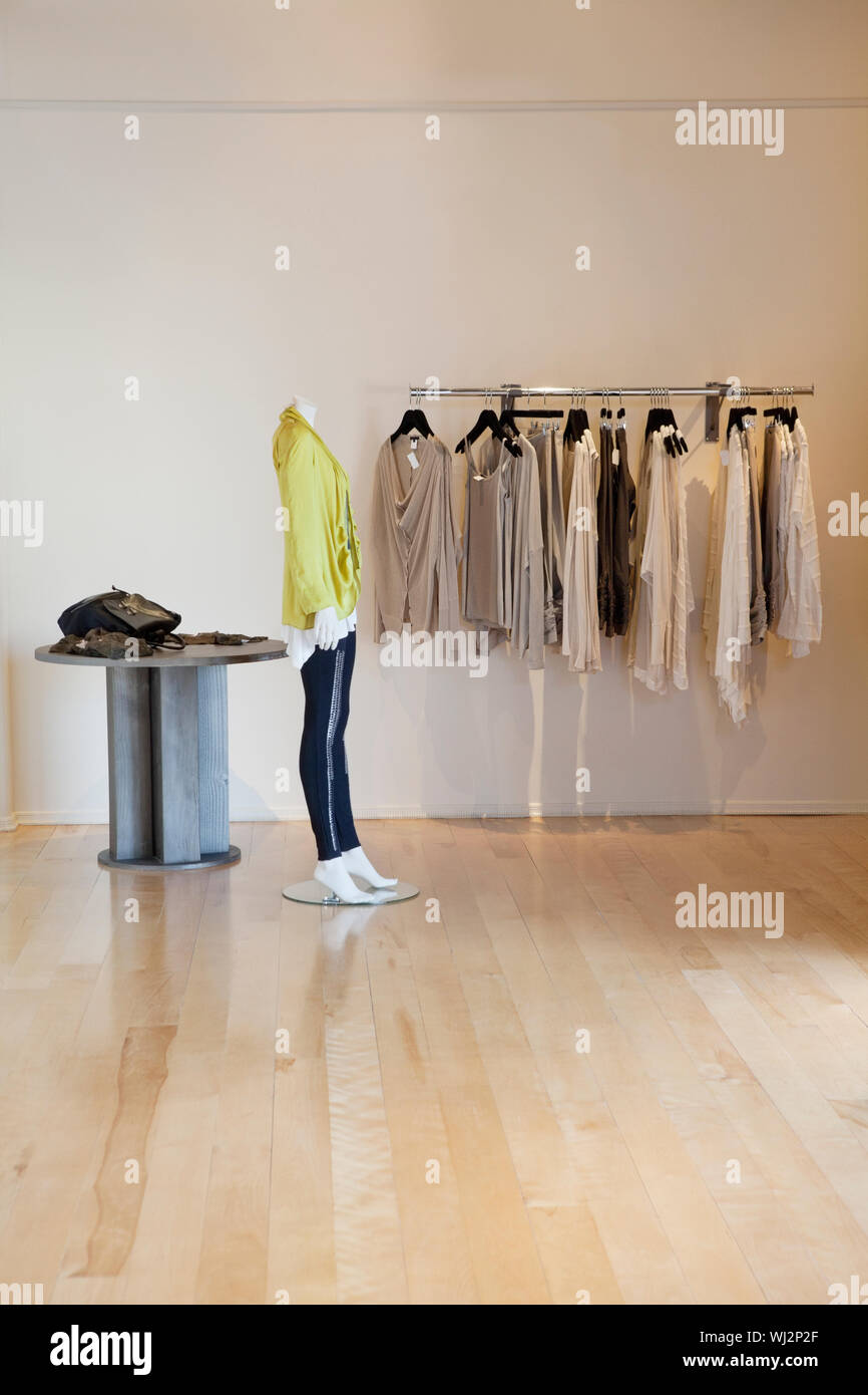 Interior of a fashionable clothes boutique Stock Photo - Alamy