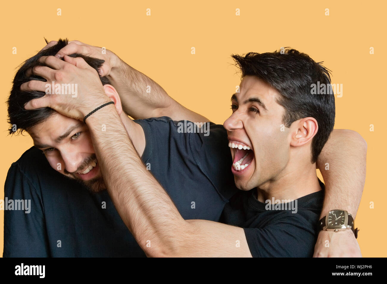 Two Men Playfighting High Resolution Stock Photography and Images - Alamy