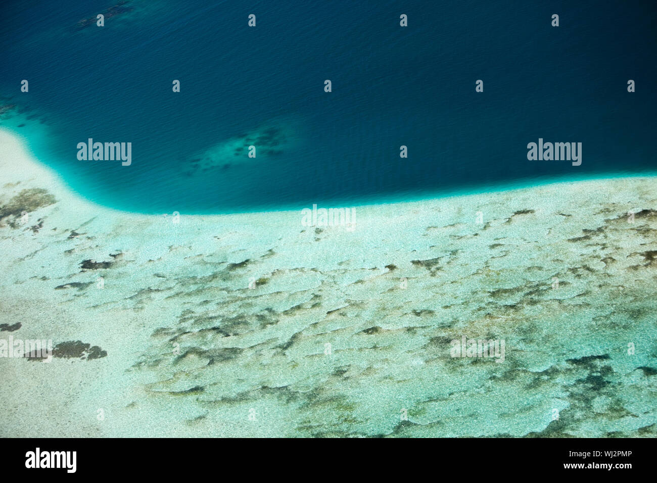 Aerial view turquoise waters of Indian ocean Stock Photo - Alamy