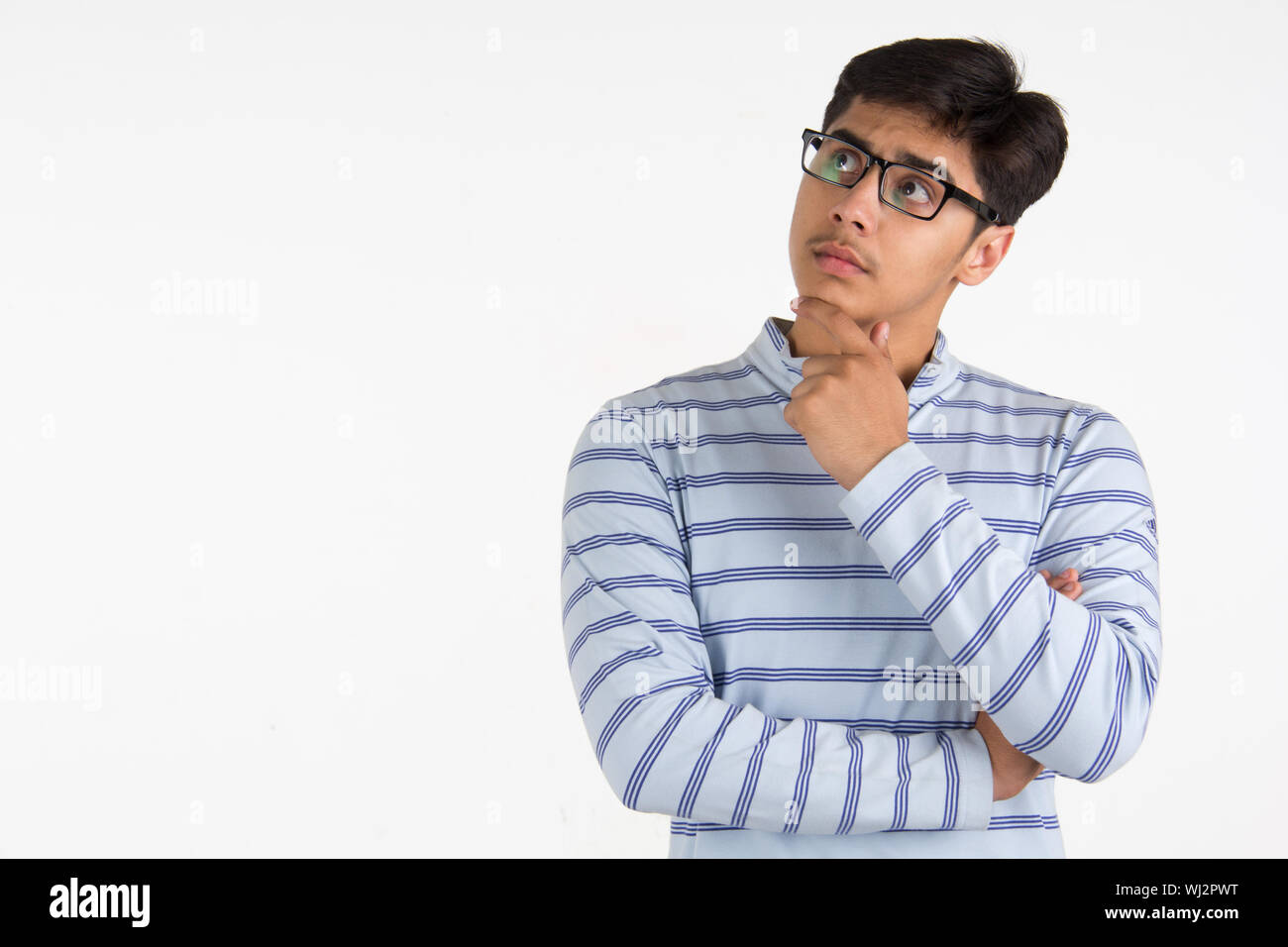 Indian man thinking hand hi-res stock photography and images - Alamy