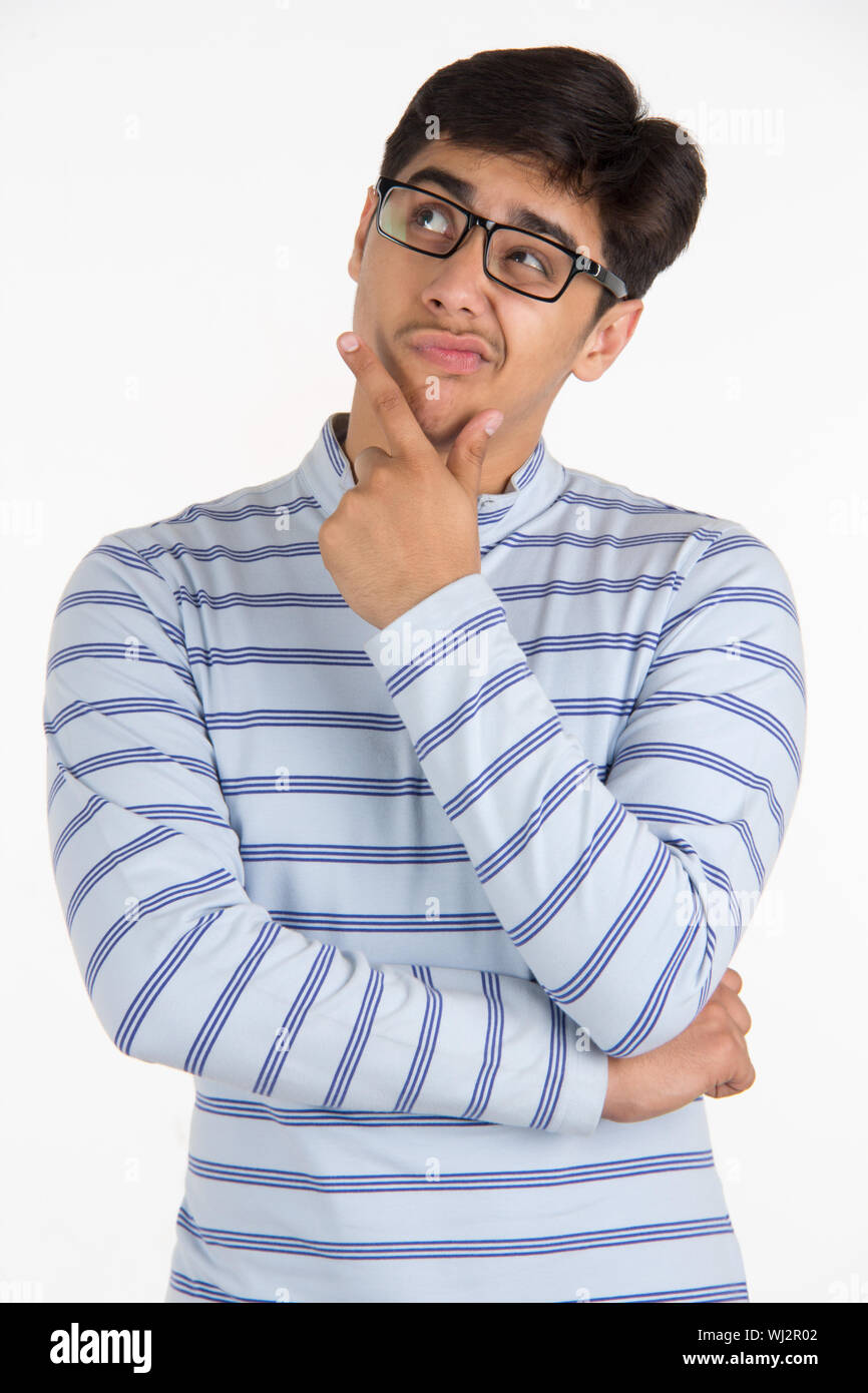 Man thinking hand on face hi-res stock photography and images - Alamy