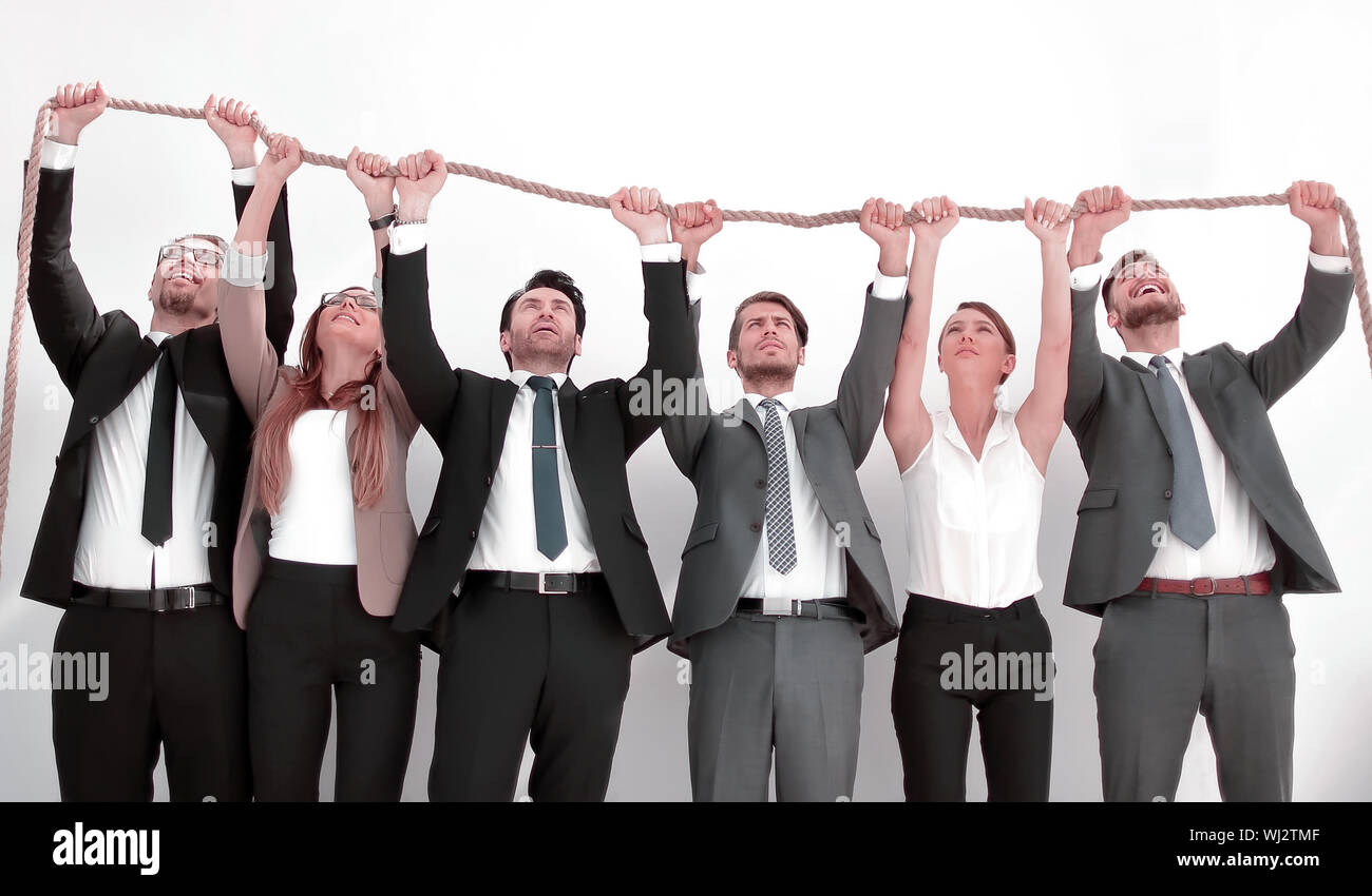 business team holding strong rope Stock Photo - Alamy
