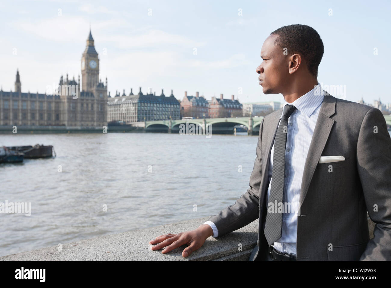 African American businessman looking at buildings Stock Photo - Alamy