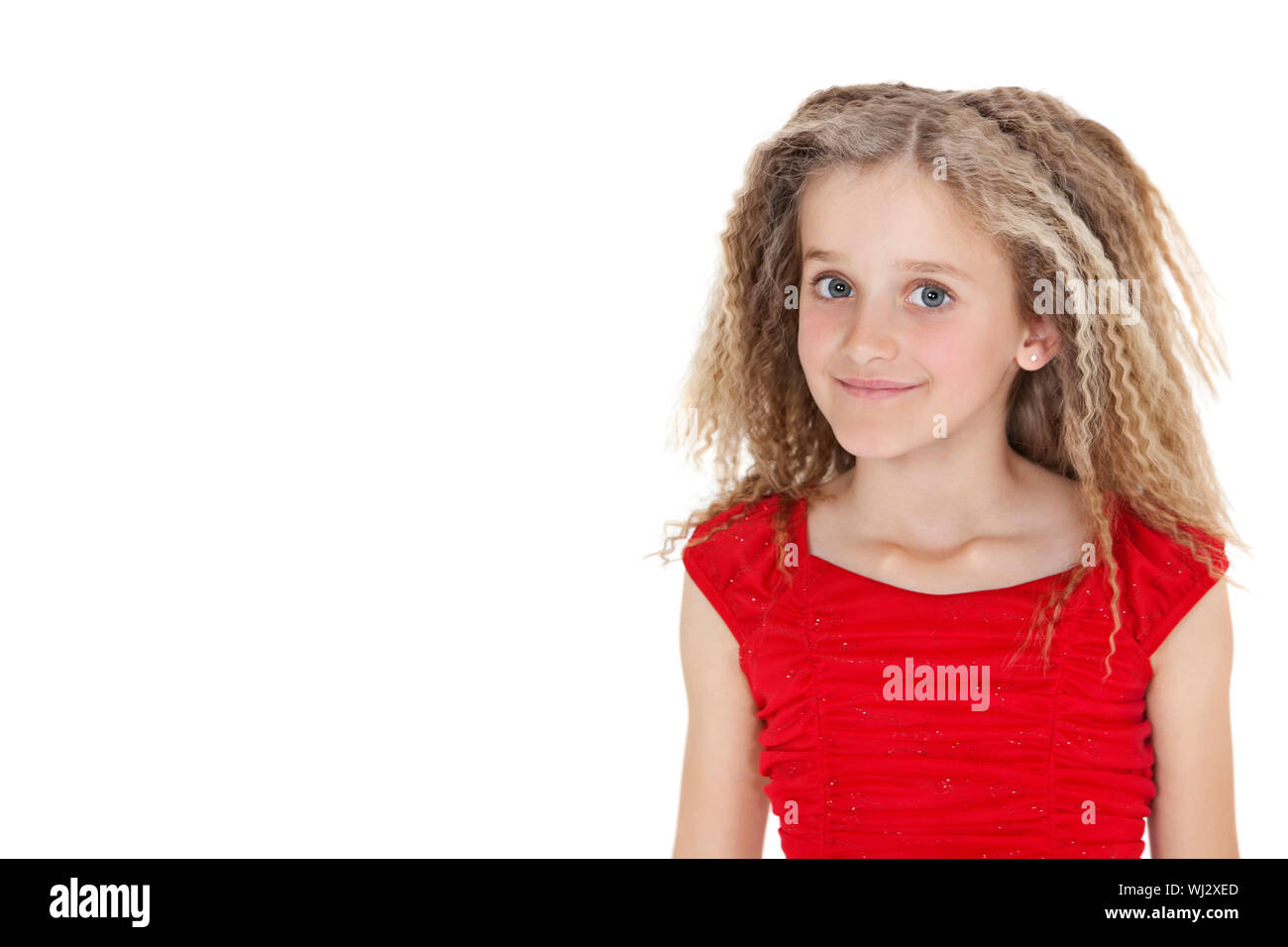 Portrait of school girl in red outfit over white background Stock Photo ...