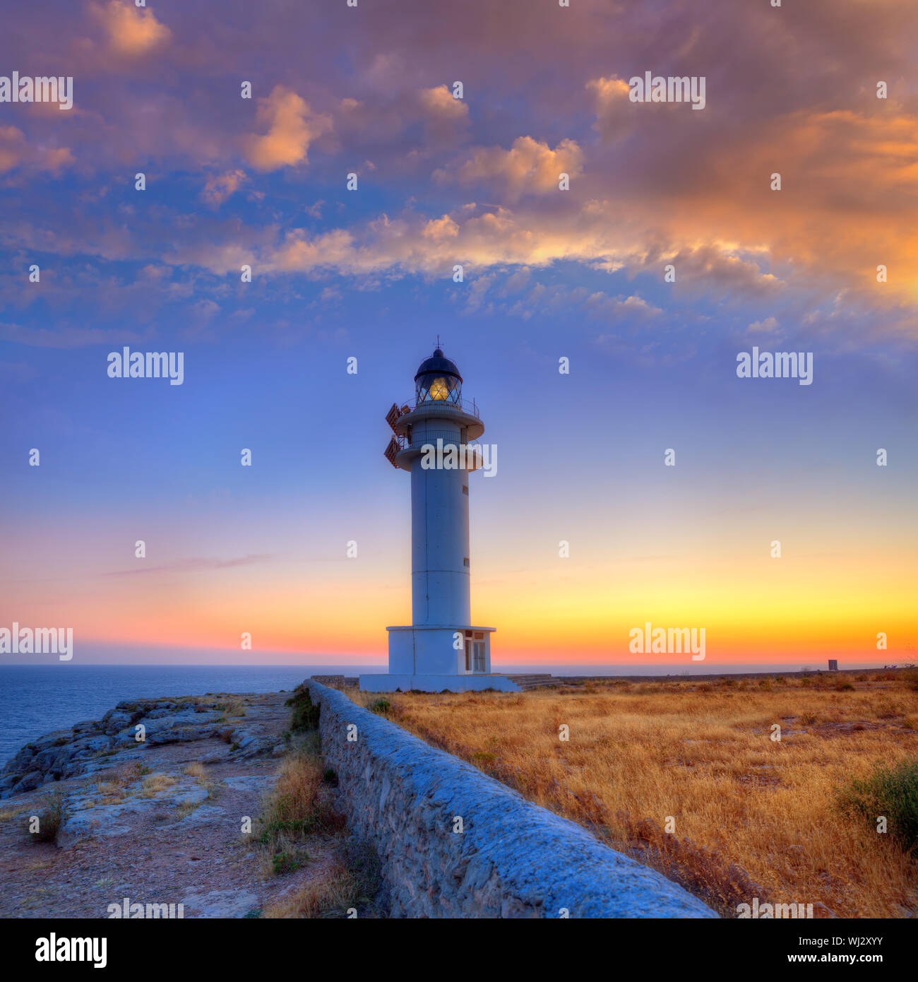 Formentera sunset in Barbaria cape lighthouse at Balearic Mediterranean ...