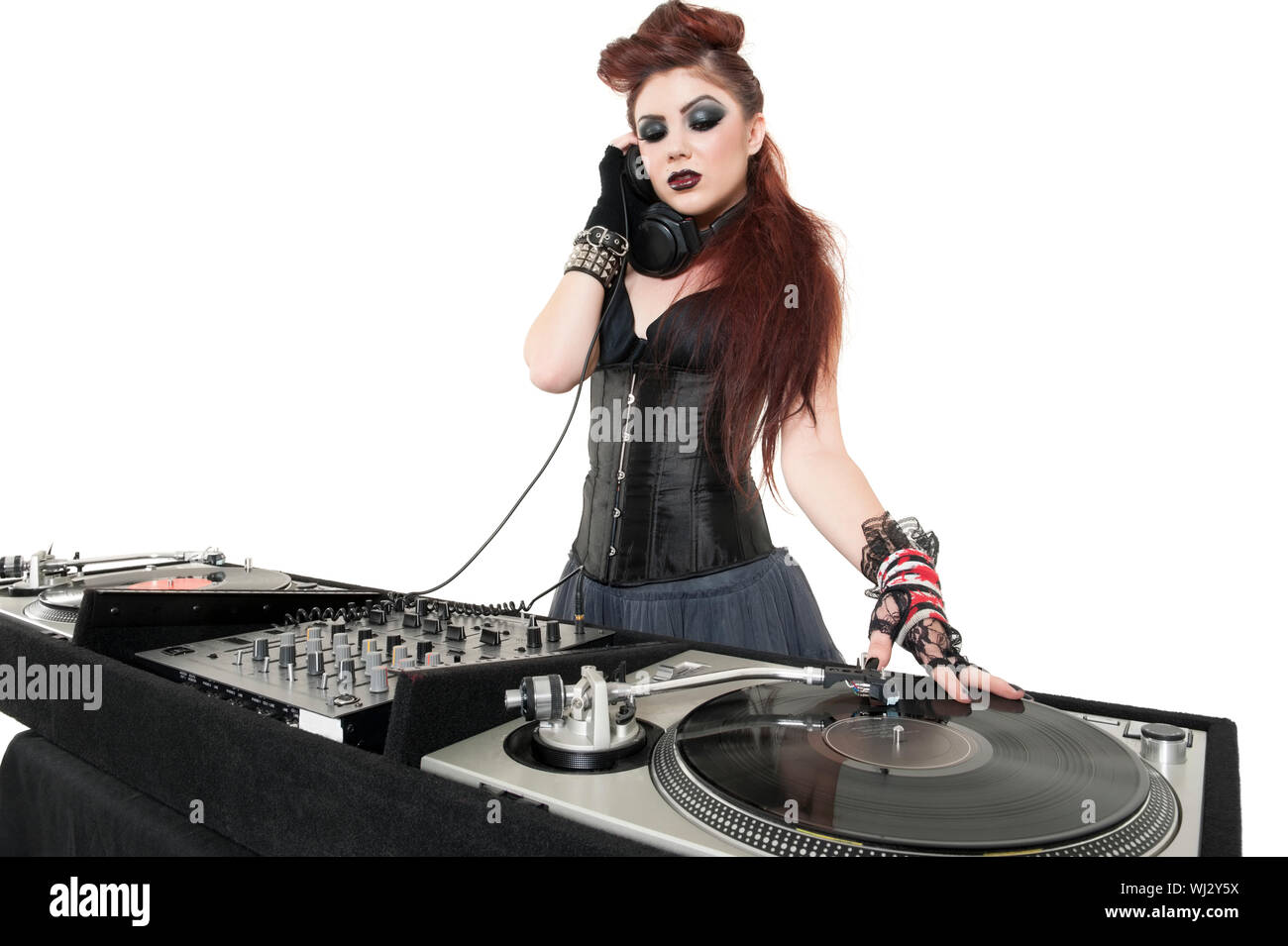 Beautiful punk DJ over white background Stock Photo - Alamy