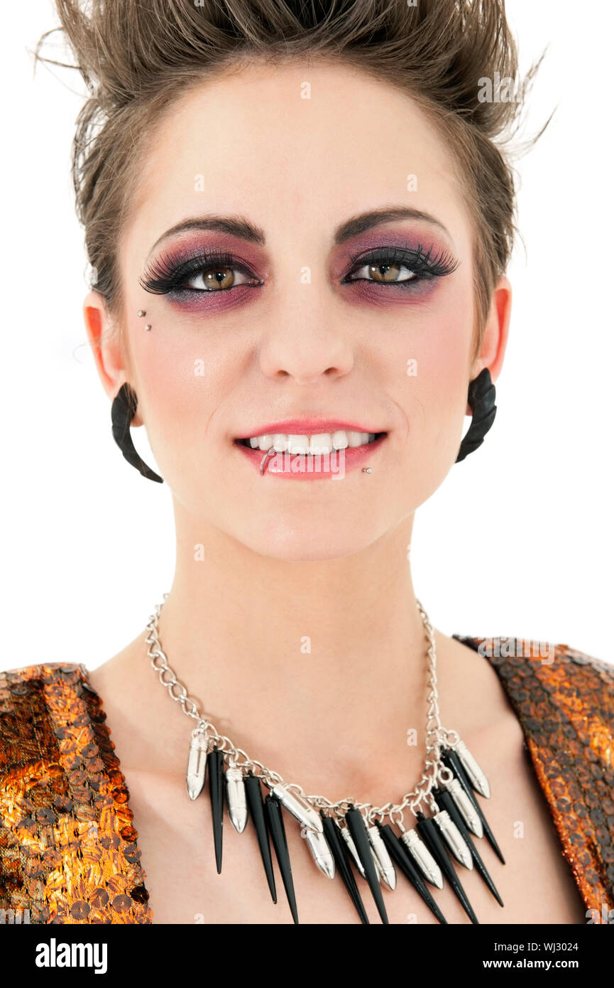 Portrait of beautiful young punk woman over white background Stock ...