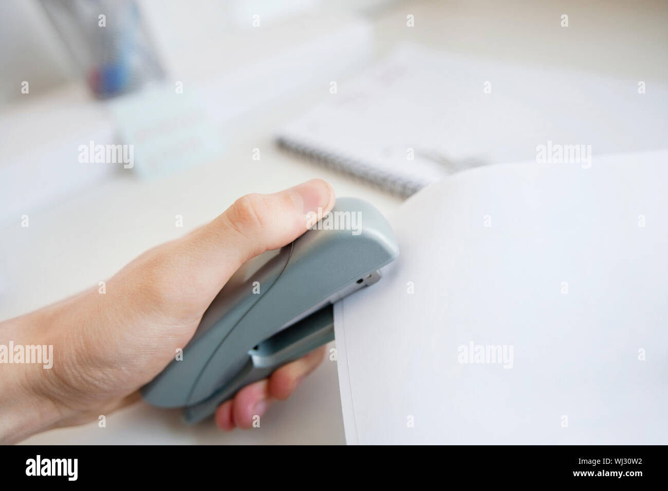 Man holding stapler close up hi-res stock photography and images - Alamy