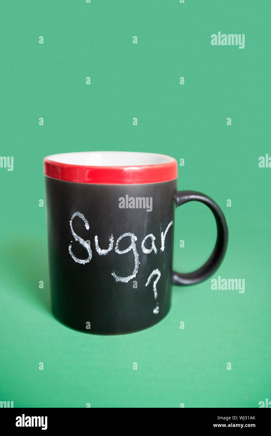 Coffee cup with text over colored background Stock Photo - Alamy