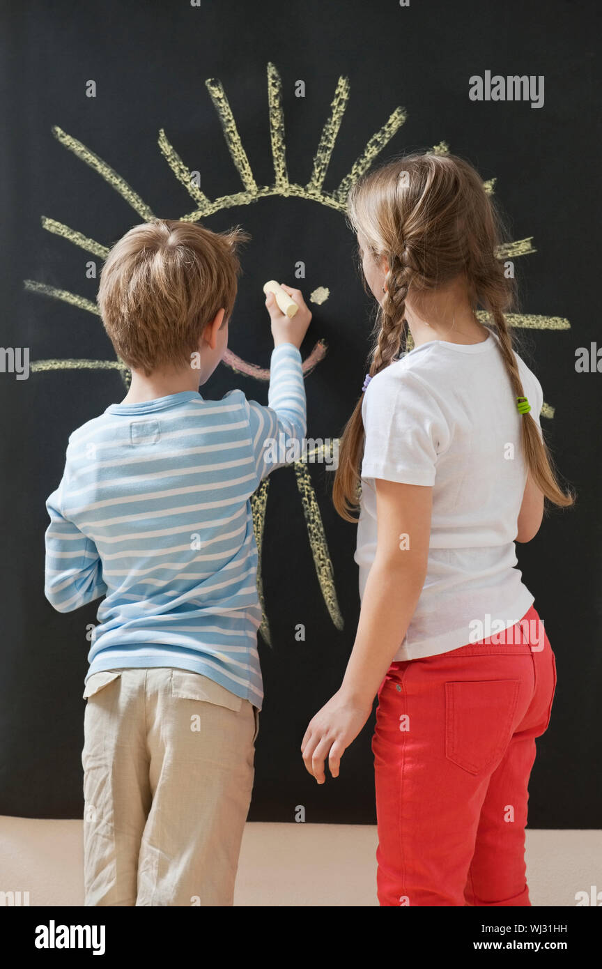 Back view teen boy girl hi-res stock photography and images - Alamy