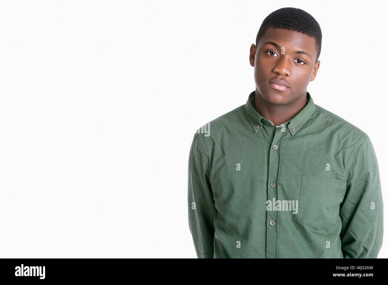 Portrait of a sad African American man over gray background Stock Photo ...