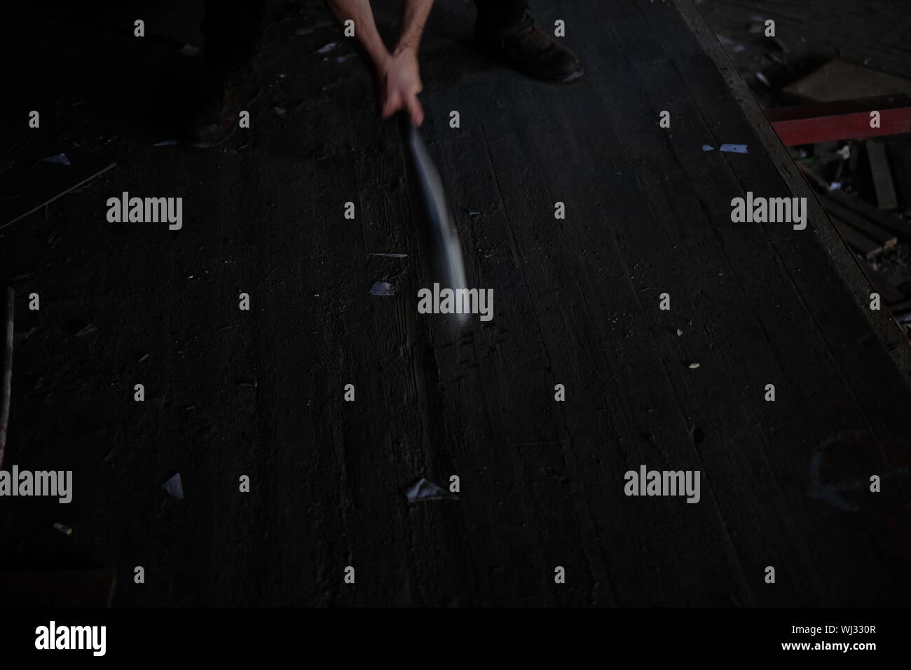 Man holding bat hi-res stock photography and images - Alamy