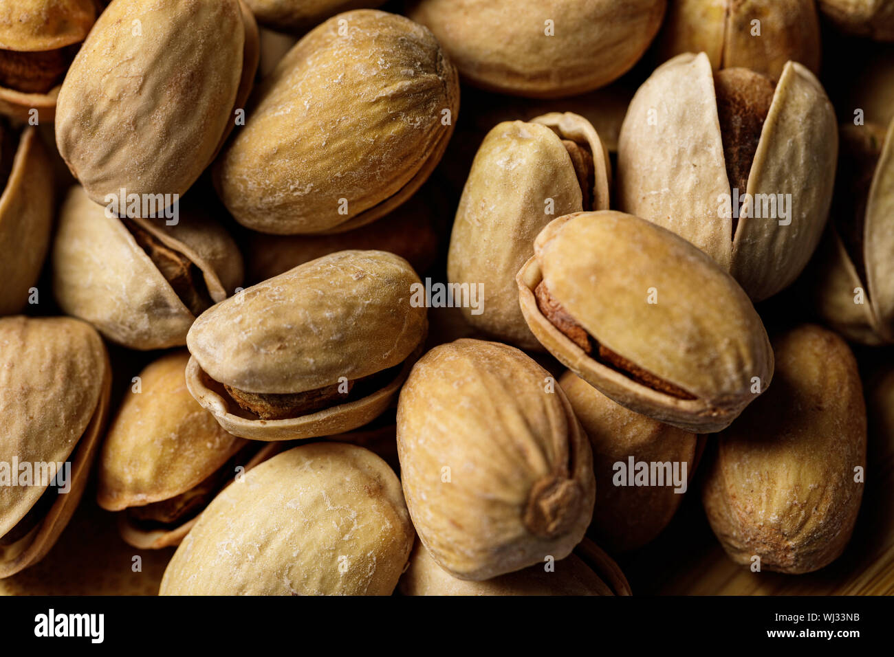 Pistachio texture. Nuts. the salted pistachios background Stock Photo ...