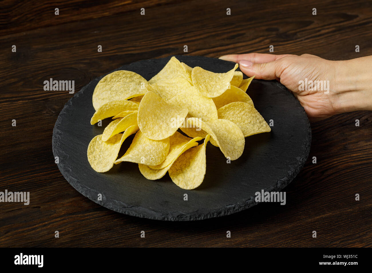 Crisps snack female hi-res stock photography and images - Alamy
