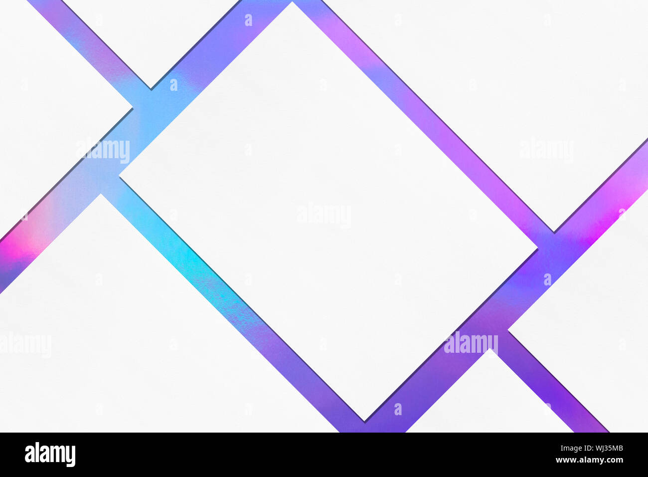 Close up of empty white rectangle poster mockups lying diagonally with ...