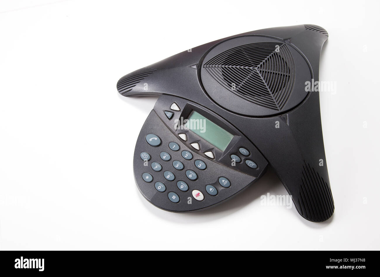 Conference phone over white background Stock Photo - Alamy