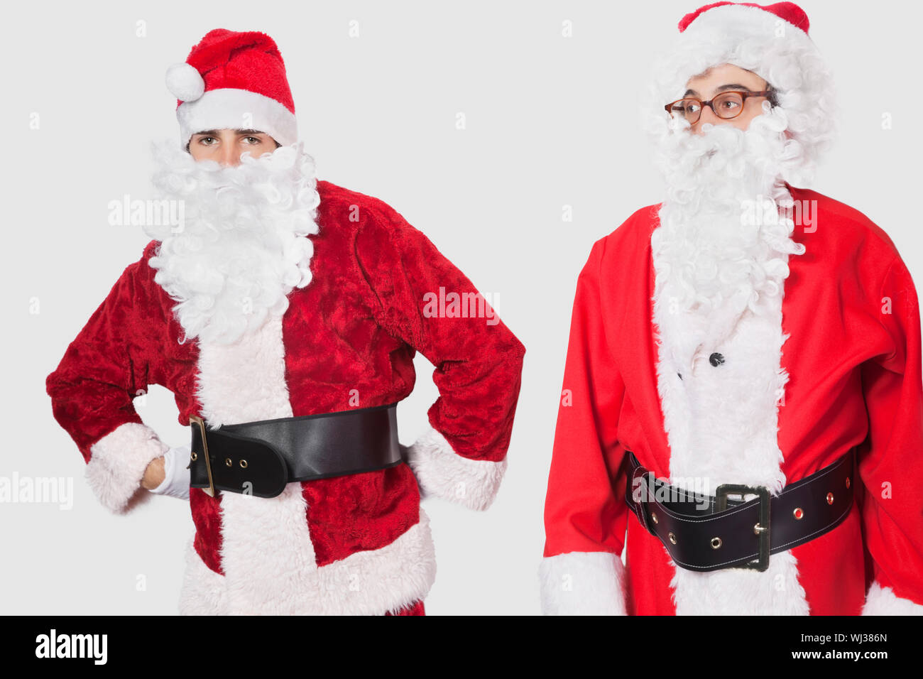 Two men dressed santa claus hi-res stock photography and images - Alamy