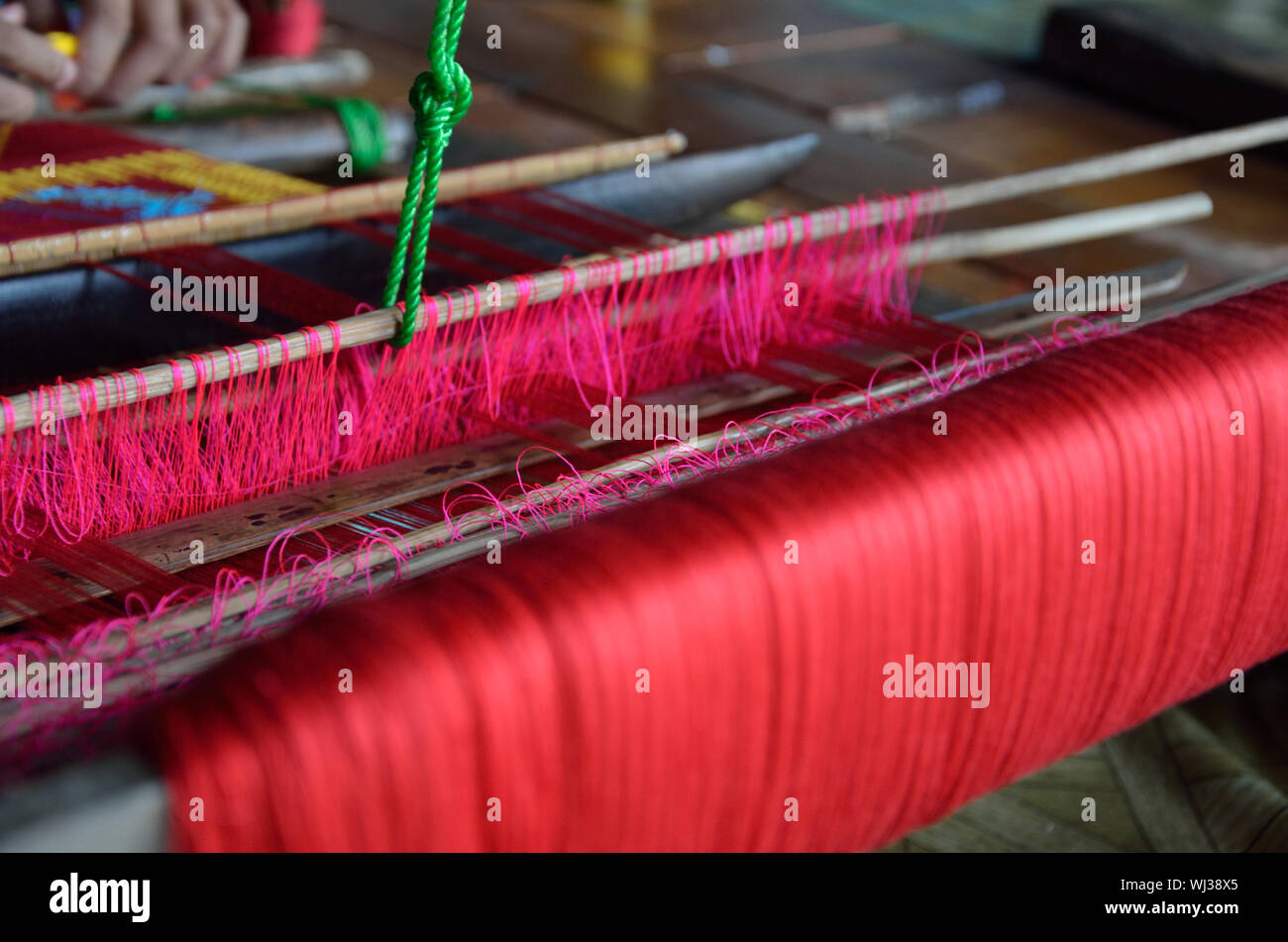 Weaving on handloom hi-res stock photography and images - Alamy