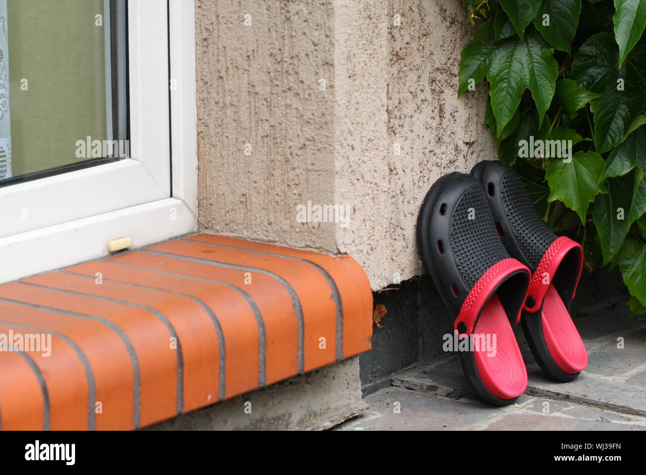 Pair of slippers made â€‹â€‹of plastic Stock Photo - Alamy