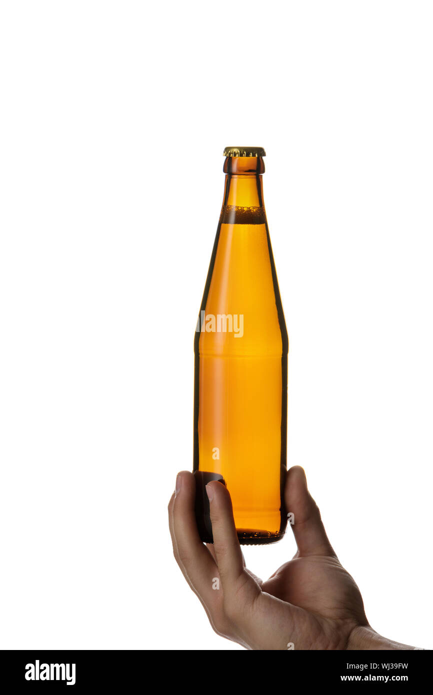 male hand holding brown beer bottle without label isolated on white ...