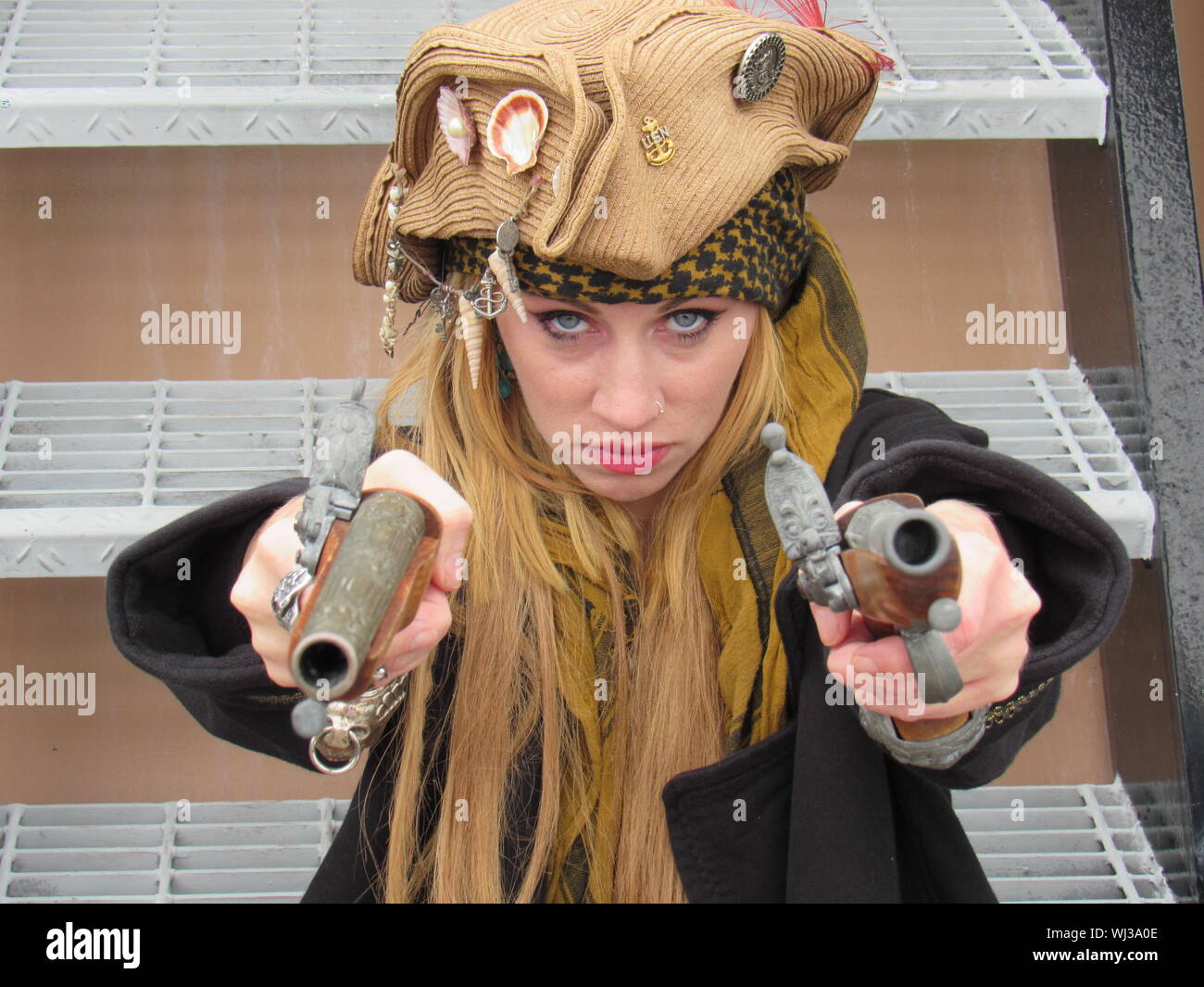 Women holding guns hi-res stock photography and images - Alamy