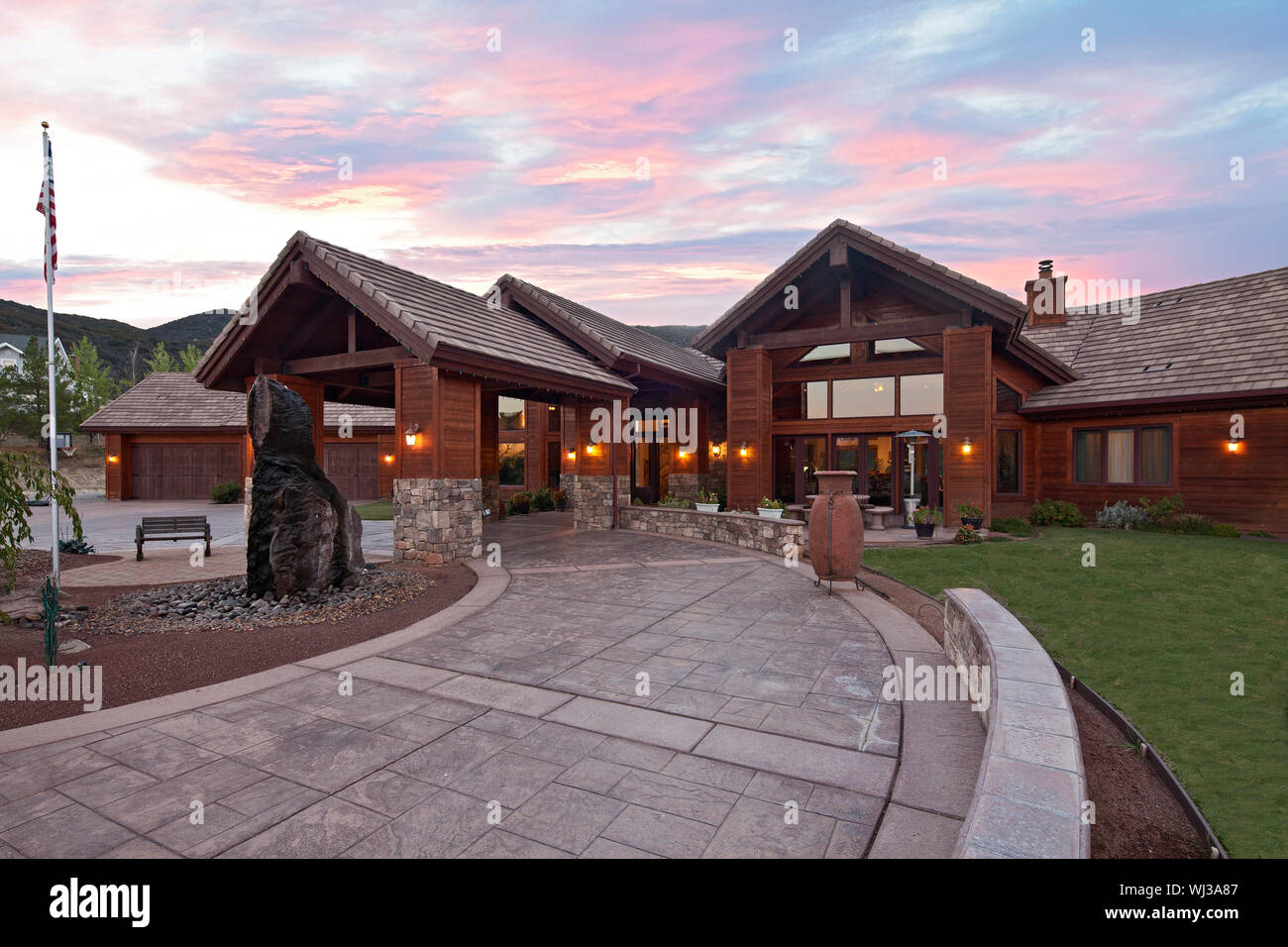 Entrance to a ranch home exterior at dusk Stock Photo - Alamy