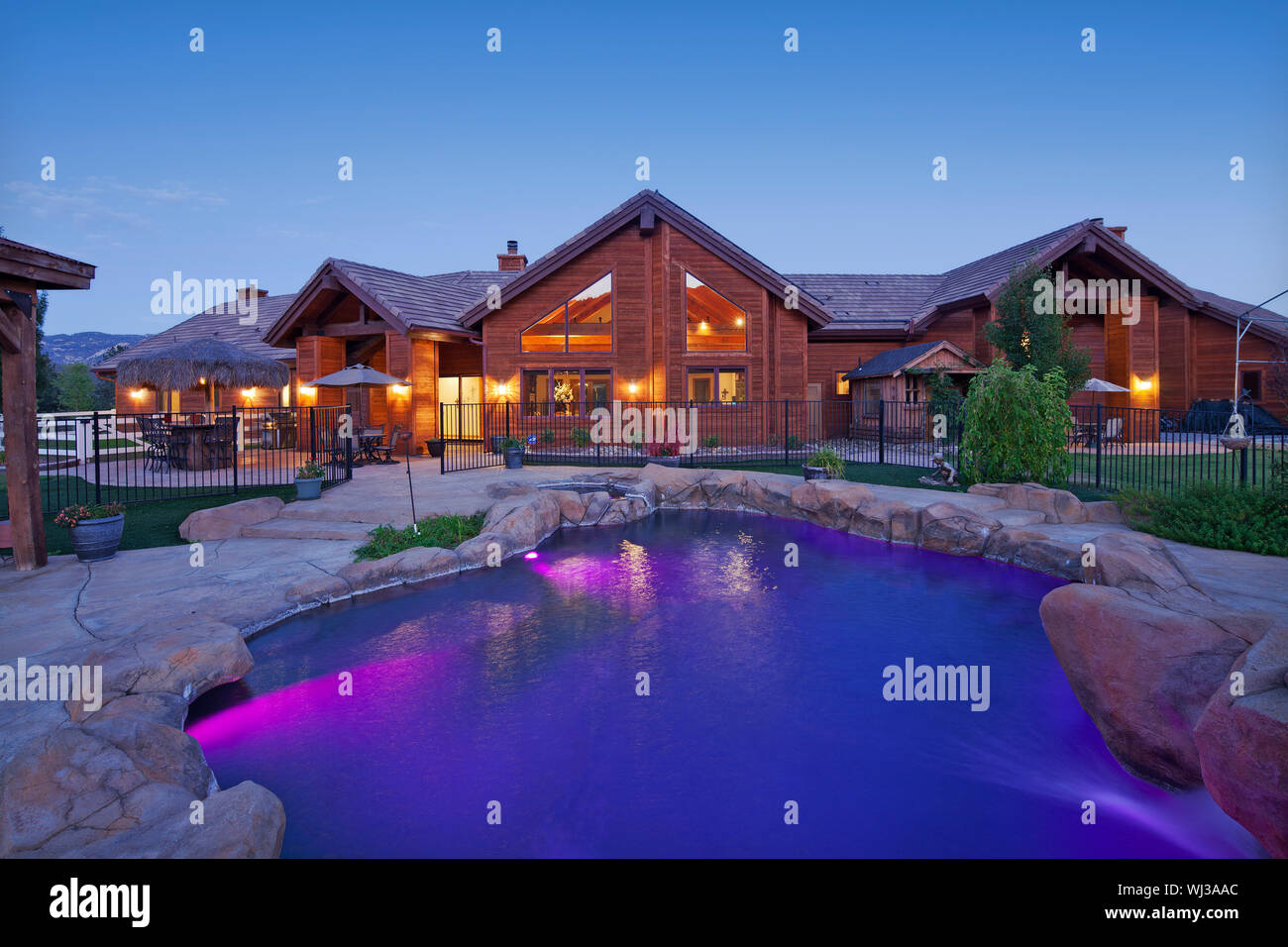 Entrance to a ranch home exterior at dusk Stock Photo - Alamy