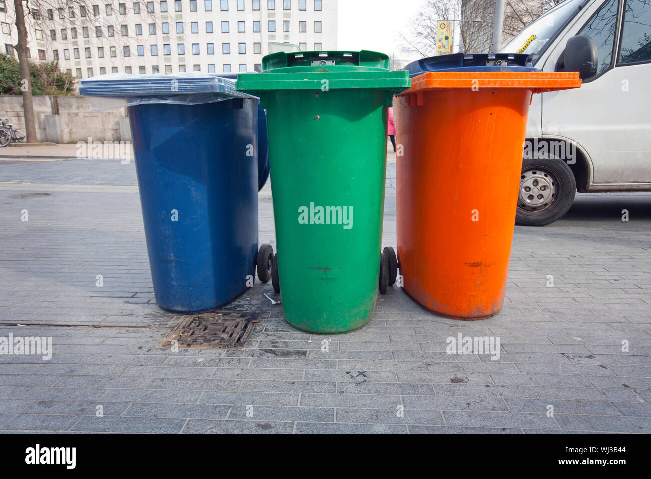 3 Recycling Bins in the street Stock Photo - Alamy