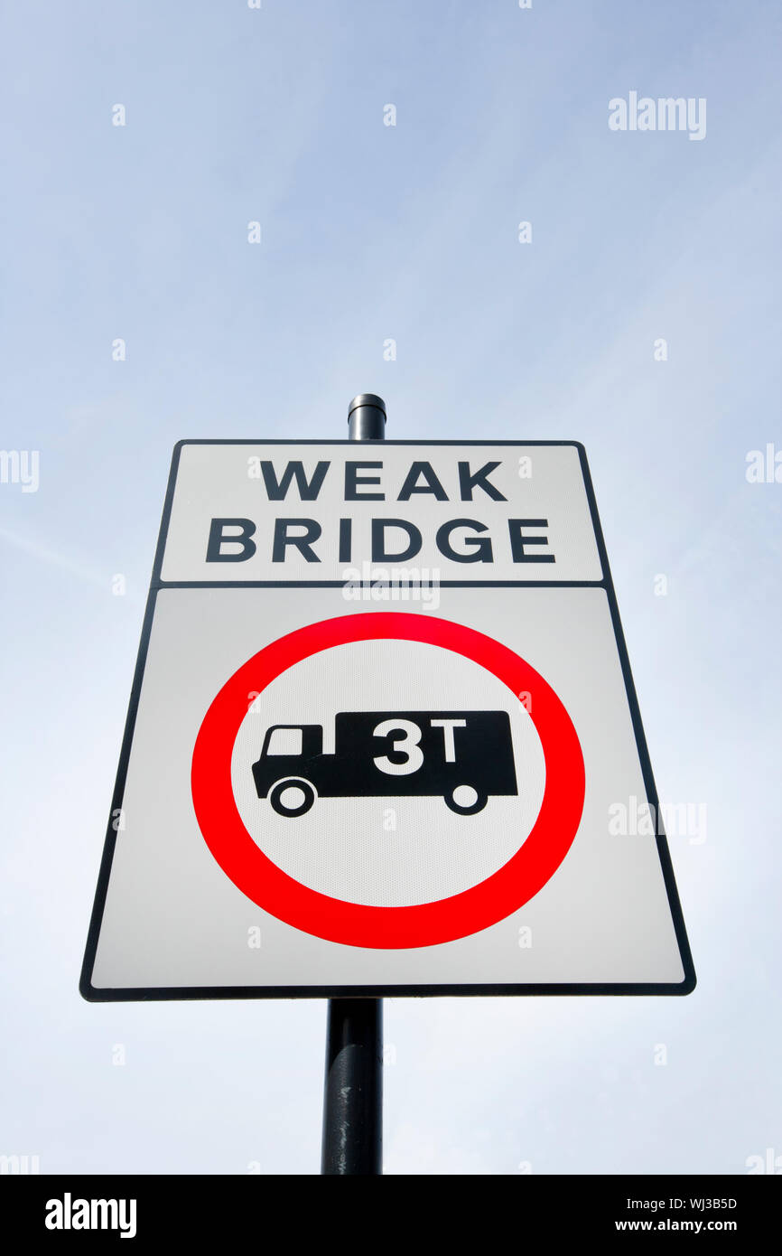 Single Directional sign isolated on blue sky Stock Photo - Alamy