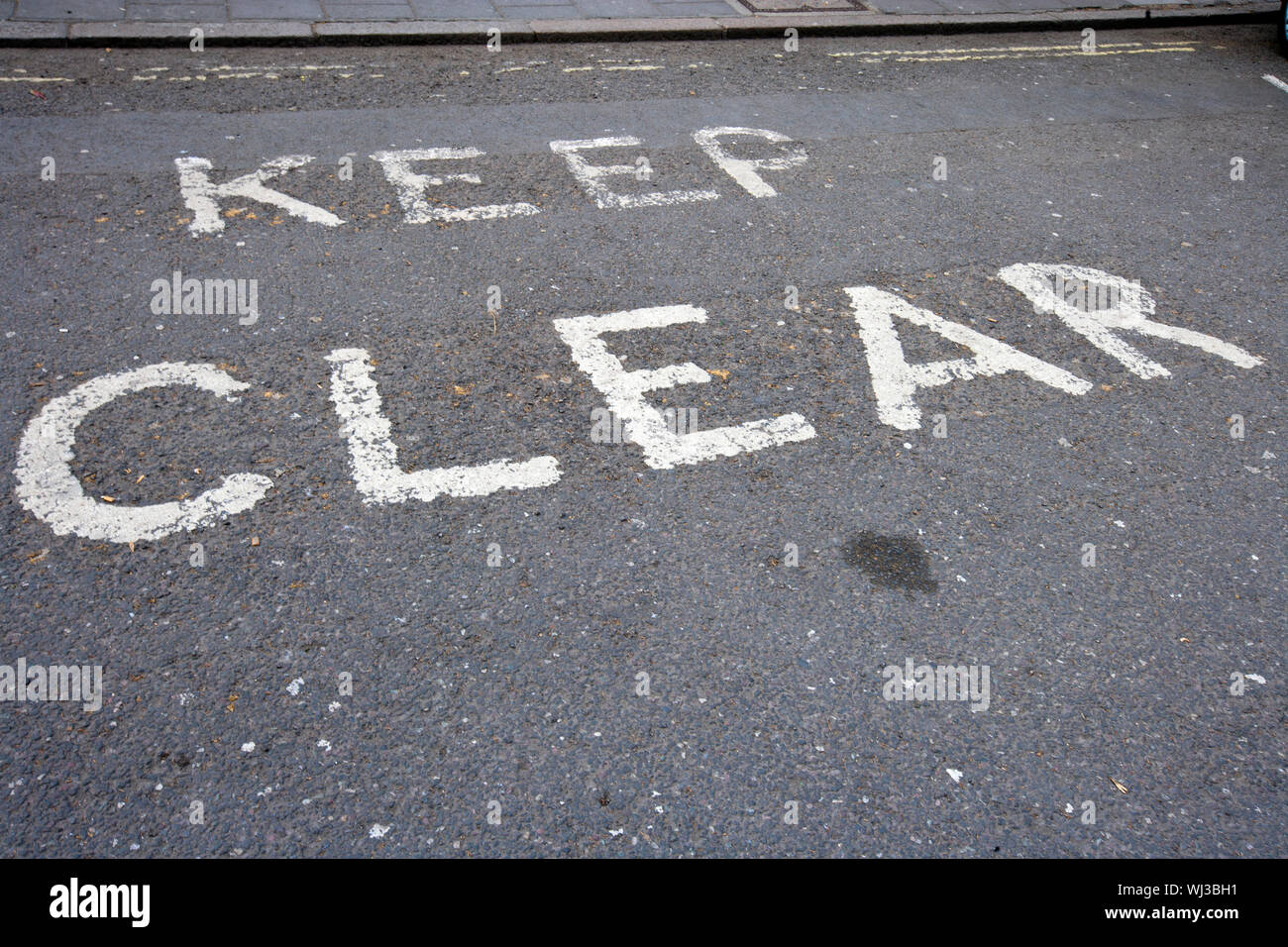 Keep clear road marking hi-res stock photography and images - Alamy