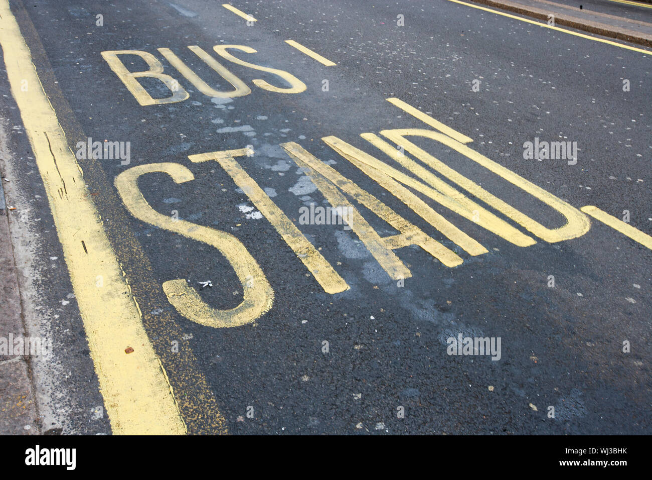 Close-Up of road marking saying Bus Stand in London, UK Stock Photo - Alamy