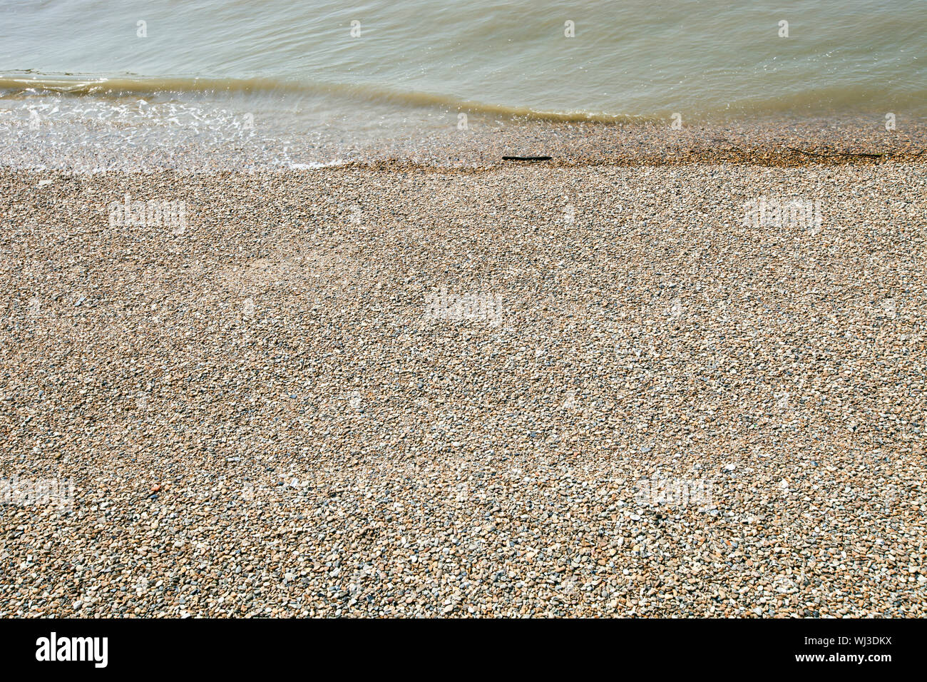 Sea and shingle beach Stock Photo - Alamy