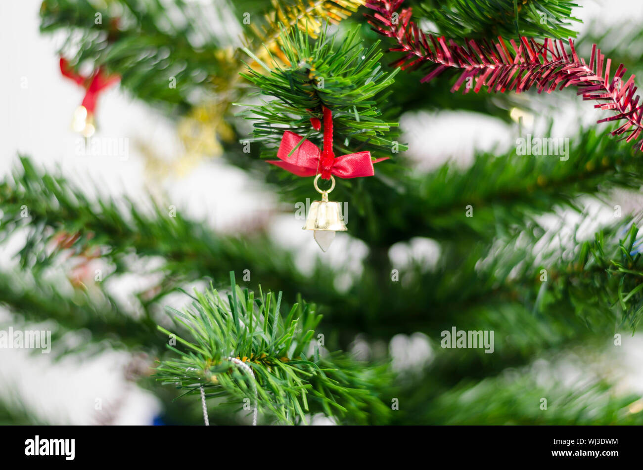 small bell on christmas tree isolated on white background Stock Photo ...