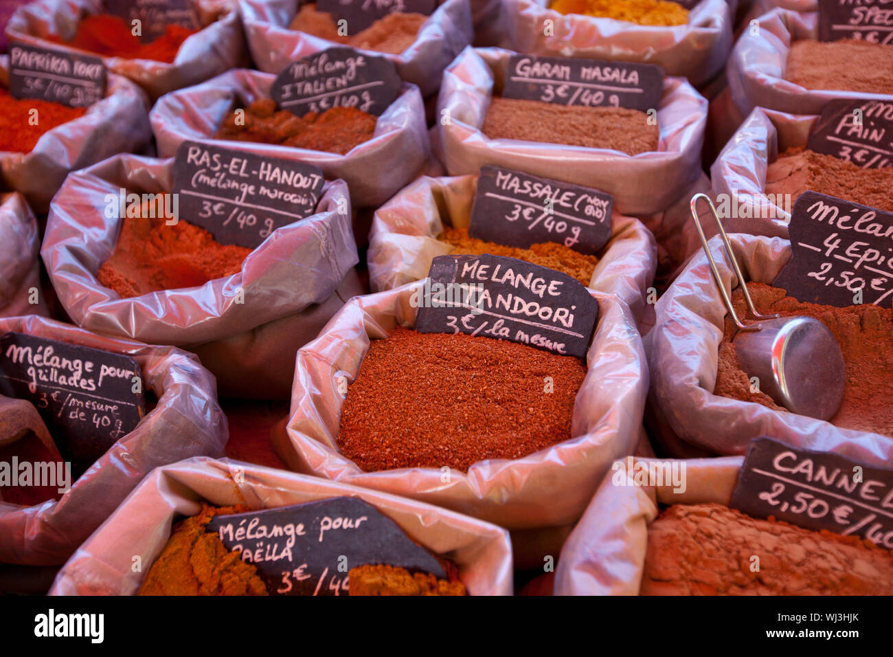 Variety of ingredients on display in store Stock Photo - Alamy