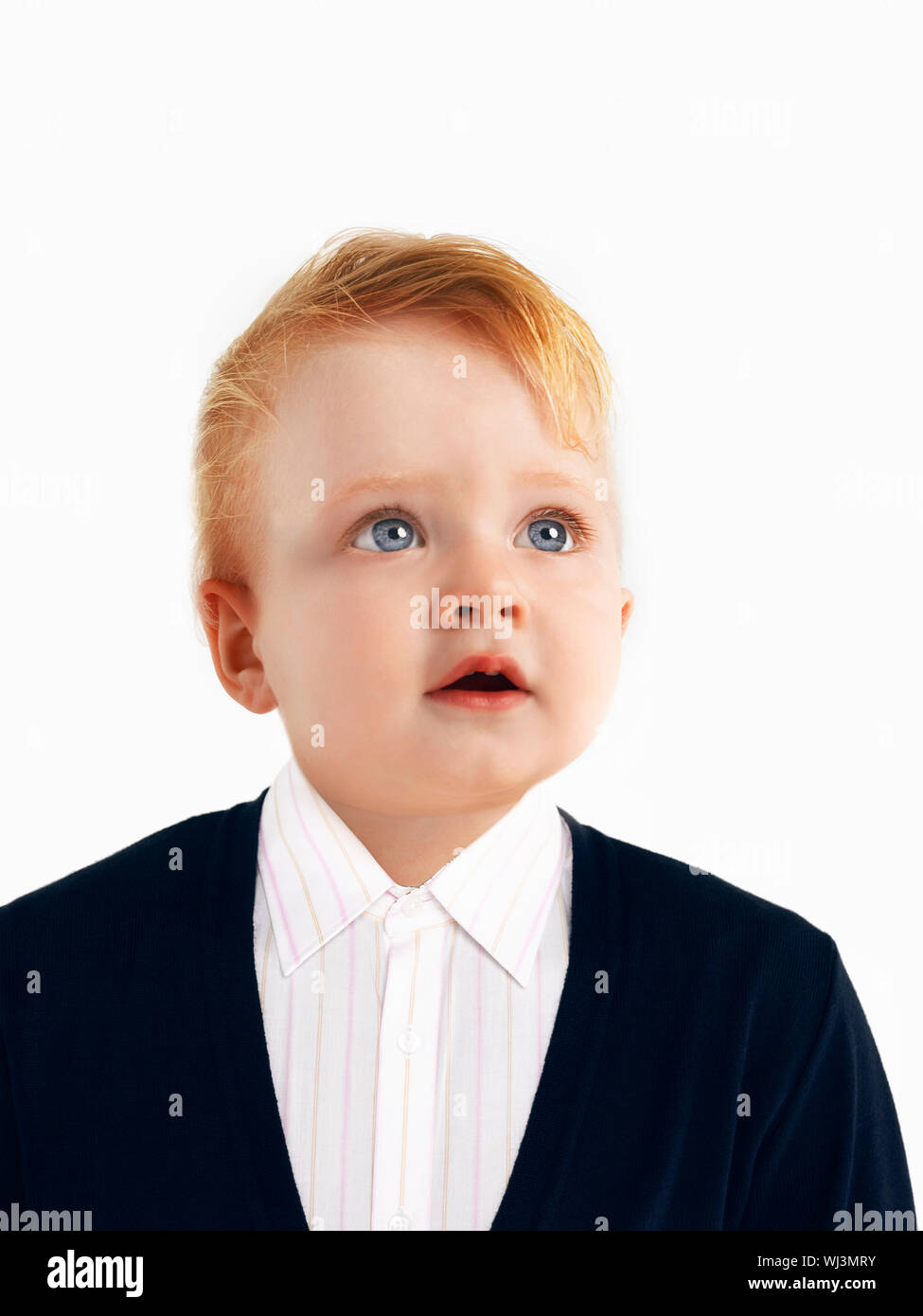 Caucasian baby dressed like an adult Stock Photo - Alamy