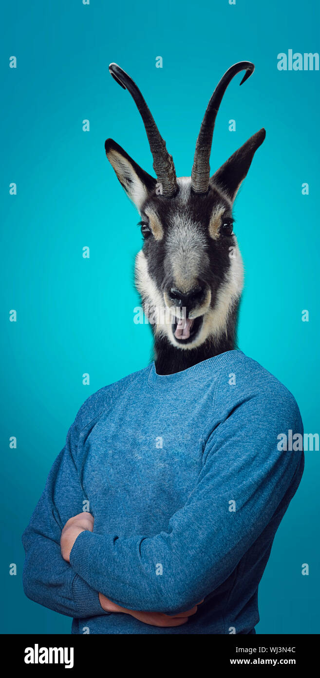 Head of a Goat on a man's body Stock Photo - Alamy