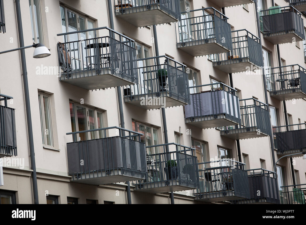 Large group of balconys on an Apartment building Stock Photo - Alamy