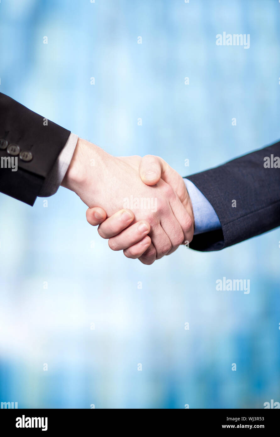 Business handshake after striking deal Stock Photo - Alamy
