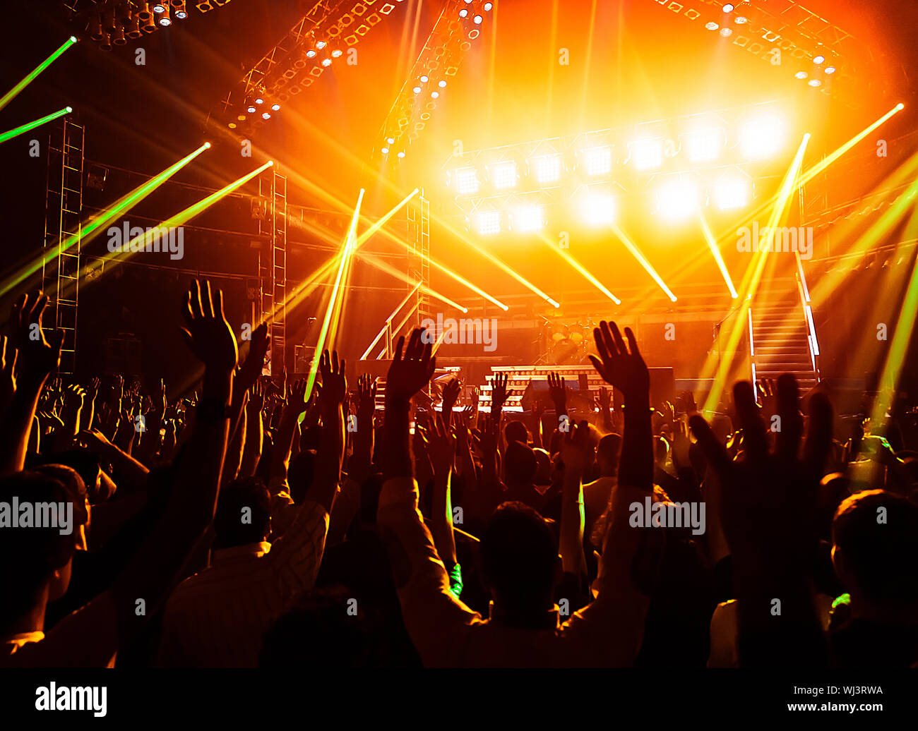 Photo of young people having fun at rock concert, active lifestyle ...