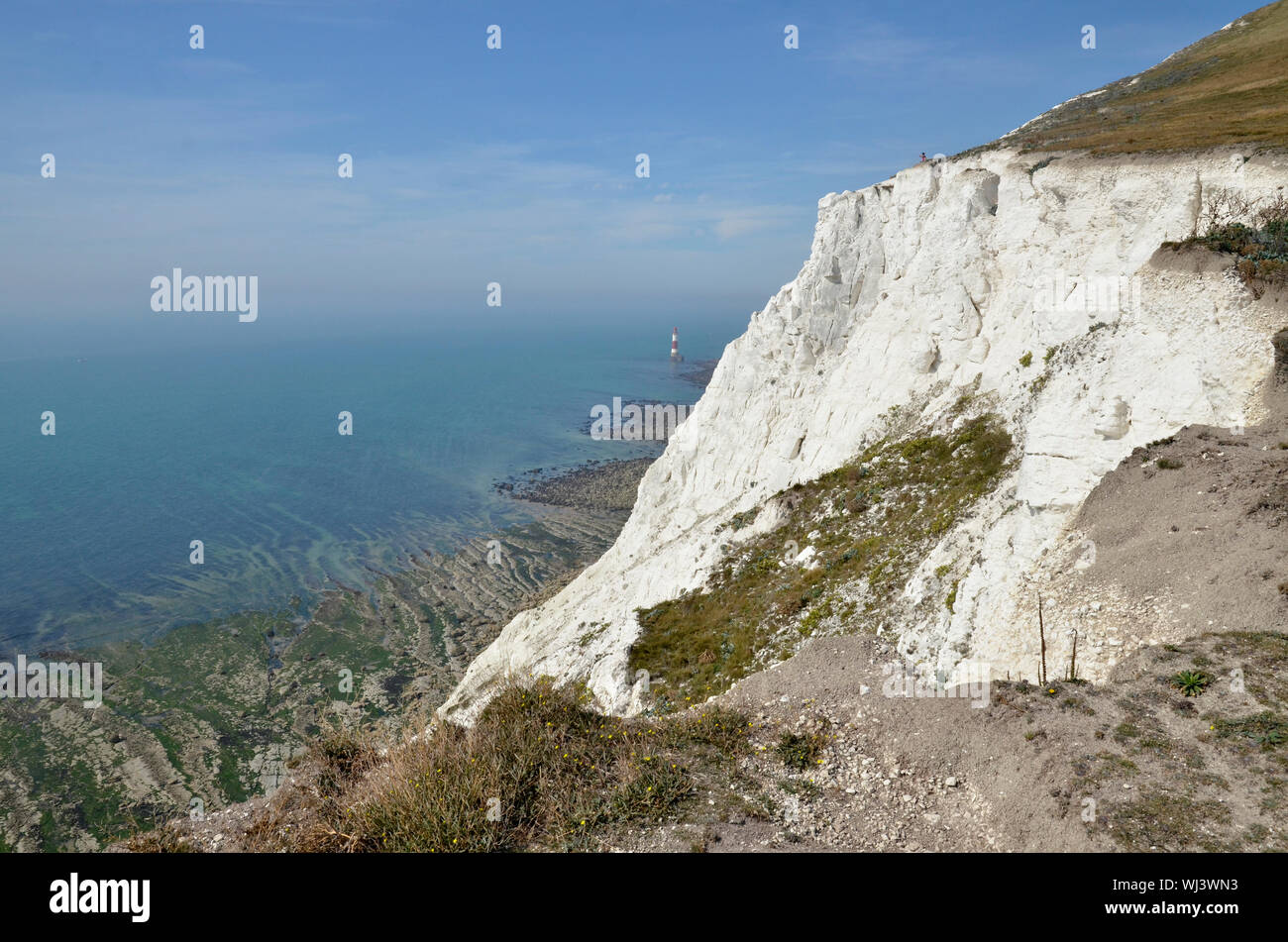 The white cliffs and lighthouse at Beachy Head on the English south ...