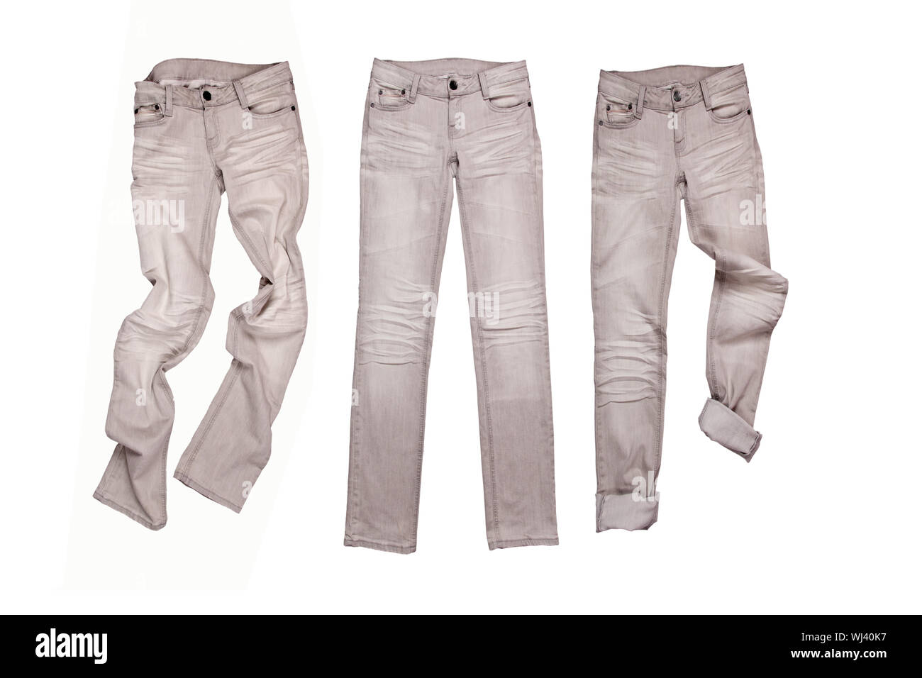 three gray jeans isolated on the white background Stock Photo - Alamy
