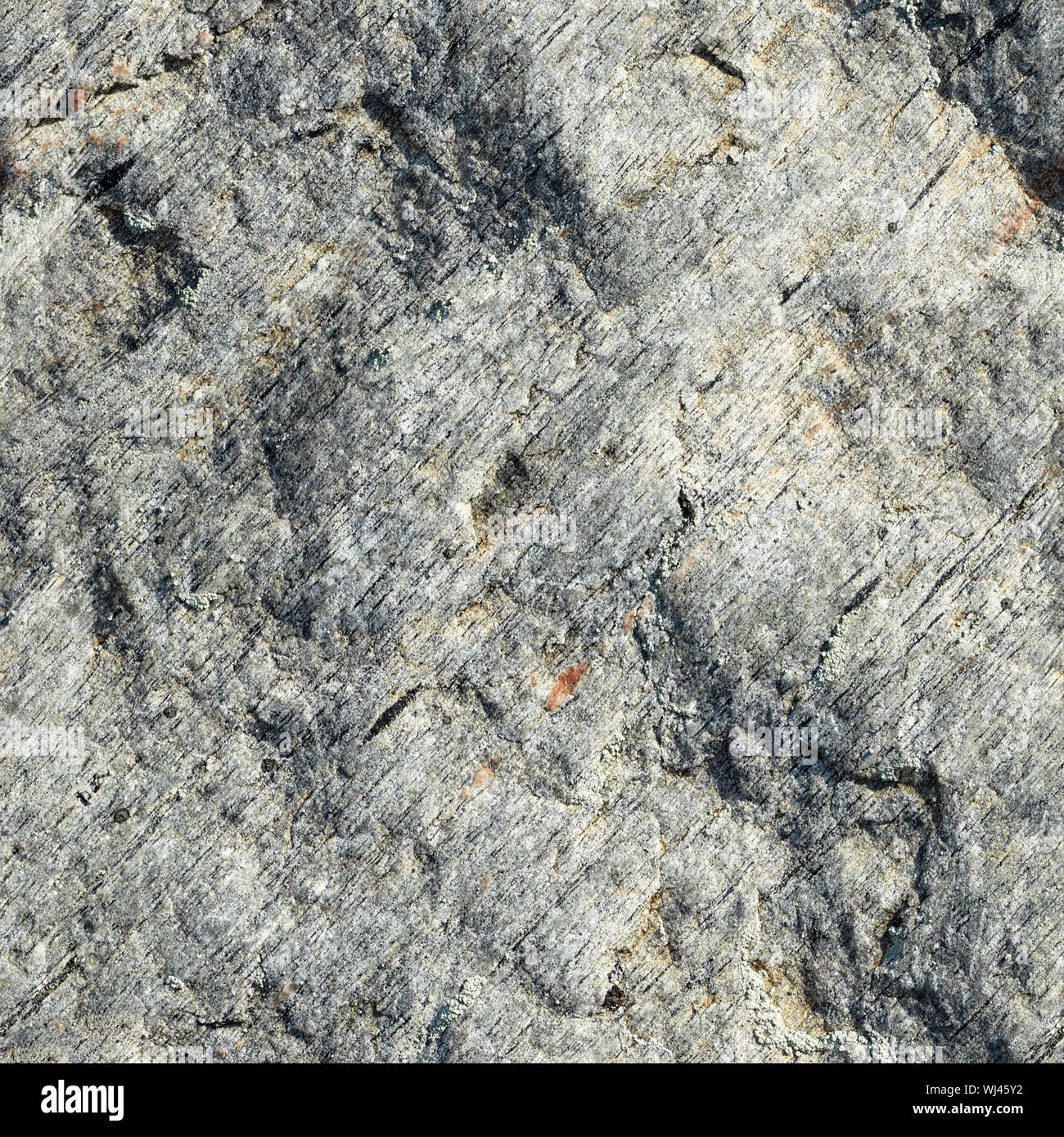 Surface of a raw rough stone - a seamless texture Stock Photo - Alamy