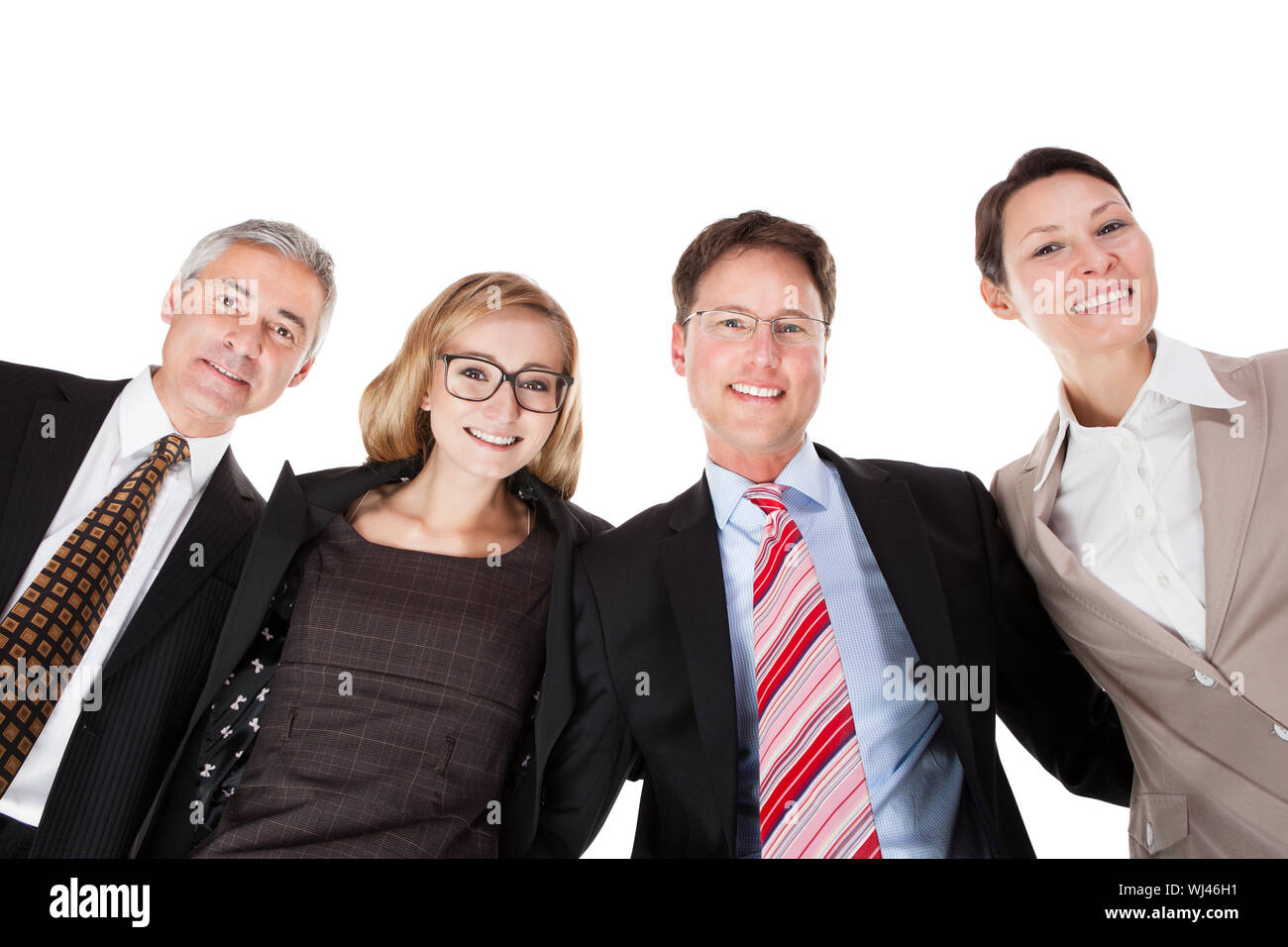Low angle view of four diverse business executives looking down into ...