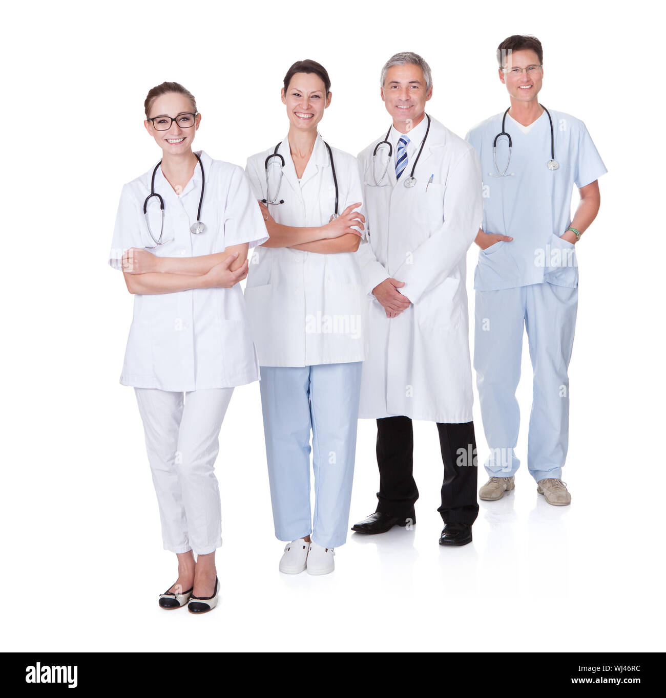 Row of smiling diverse medical doctors and nurses in white uniforms ...